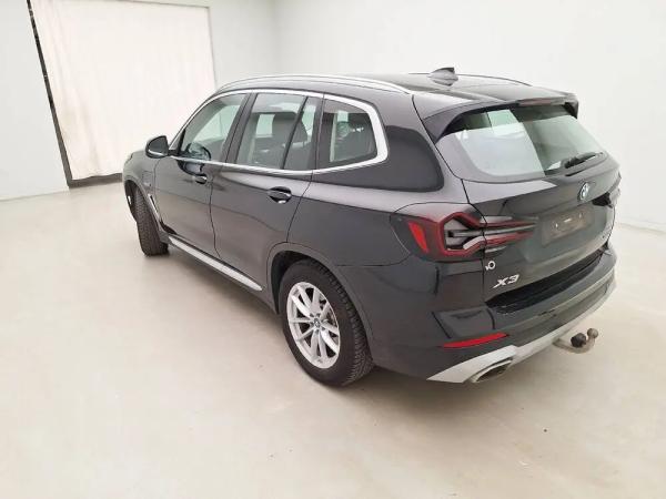 Black BMW X3 2021 in Riga, with an engine capacity of 2.00 L and mileage of 152 thousand km for 29990 €, photo 4 on AUTOMOTO.COM.LV