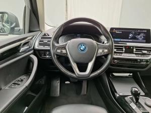 Black BMW X3 2021 in Riga, with an engine capacity of 2.00 L and mileage of 152 thousand km for 29990 €, photo 7 on AUTOMOTO.COM.LV
