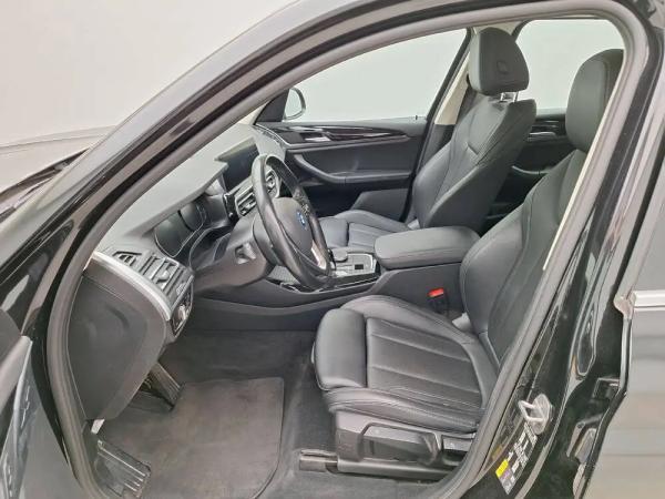 Black BMW X3 2021 in Riga, with an engine capacity of 2.00 L and mileage of 152 thousand km for 29990 €, photo 7 on AUTOMOTO.COM.LV