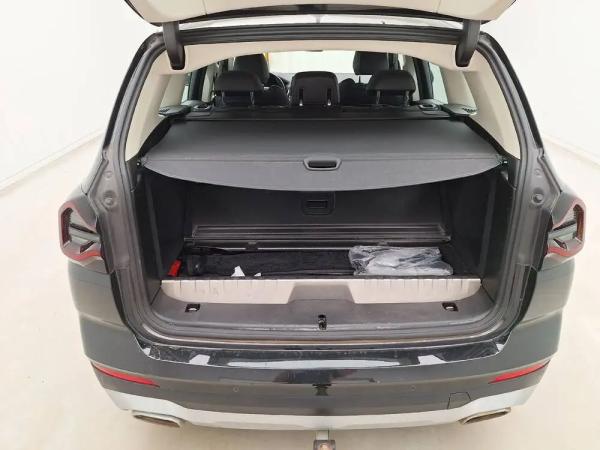 Black BMW X3 2021 in Riga, with an engine capacity of 2.00 L and mileage of 152 thousand km for 29990 €, photo 9 on AUTOMOTO.COM.LV