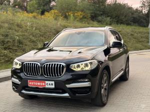 Black BMW X3 2021 in Vilnius, with an engine capacity of 2.00 L and mileage of 157 thousand km for 23950 €, photo  on AUTOMOTO.COM.LV