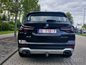 Black BMW X3 2021 in Riga, with an engine capacity of 2.00 L and mileage of 152 thousand km for 29990 €, photo 9 on AUTOMOTO.COM.LV
