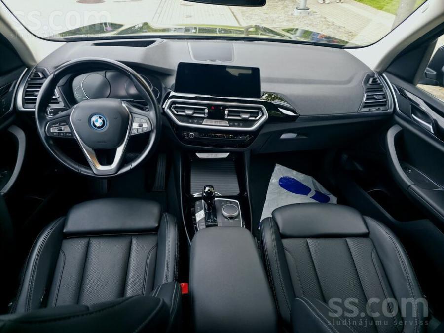 Black BMW X3 2021 in Riga, with an engine capacity of 2.00 L and mileage of 152 thousand km for 29990 €, photo 12 on AUTOMOTO.COM.LV