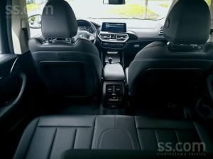Black BMW X3 2021 in Riga, with an engine capacity of 2.00 L and mileage of 152 thousand km for 29990 €, photo 29 on AUTOMOTO.COM.LV