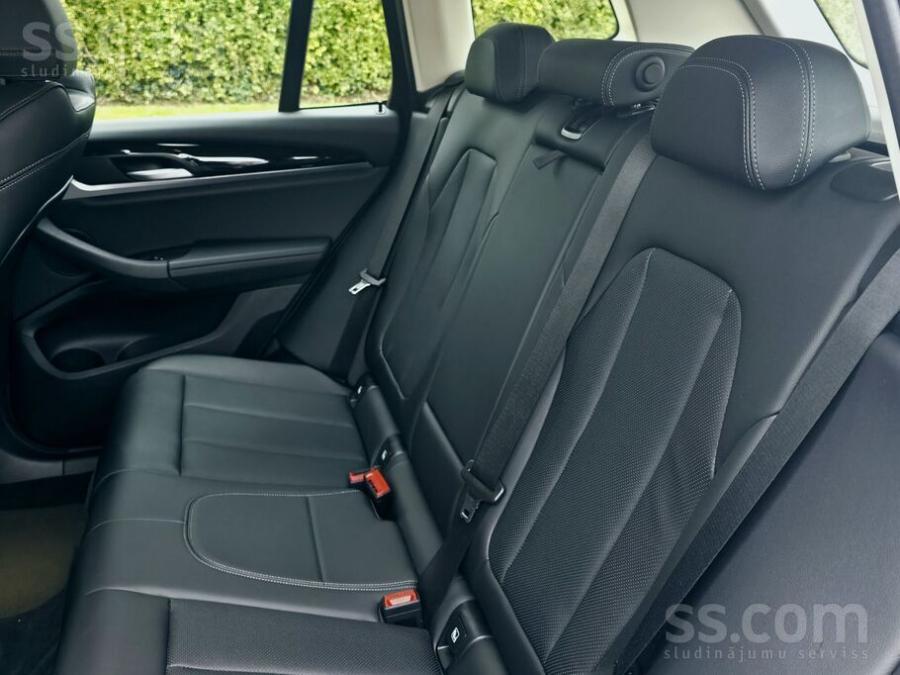 Black BMW X3 2021 in Riga, with an engine capacity of 2.00 L and mileage of 152 thousand km for 29990 €, photo 30 on AUTOMOTO.COM.LV