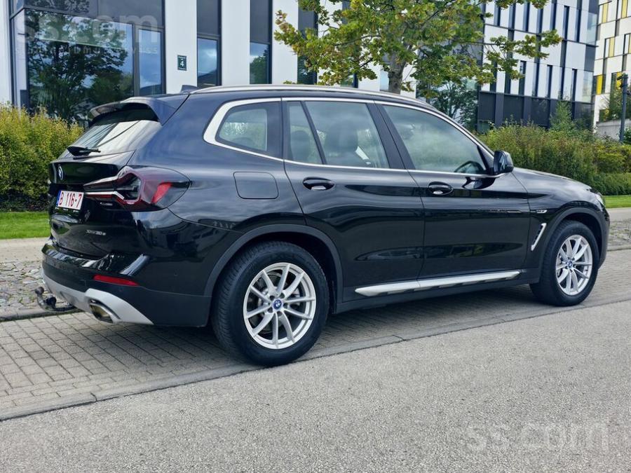 Black BMW X3 2021 in Riga, with an engine capacity of 2.00 L and mileage of 152 thousand km for 29990 €, photo 34 on AUTOMOTO.COM.LV