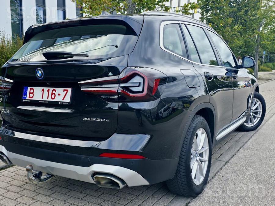 Black BMW X3 2021 in Riga, with an engine capacity of 2.00 L and mileage of 152 thousand km for 29990 €, photo 35 on AUTOMOTO.COM.LV