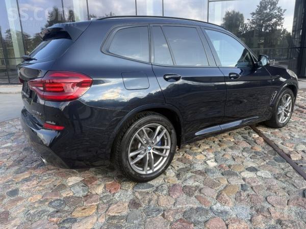 Black BMW X3 2021 in Riga, with an engine capacity of 3.00 L and mileage of 145 thousand km for 21950 €, photo 8 on AUTOMOTO.COM.LV
