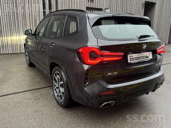 Black BMW X3 2022 in Riga, with an engine capacity of 3.00 L and mileage of 134 thousand km for 33999 €, photo 5 on AUTOMOTO.COM.LV