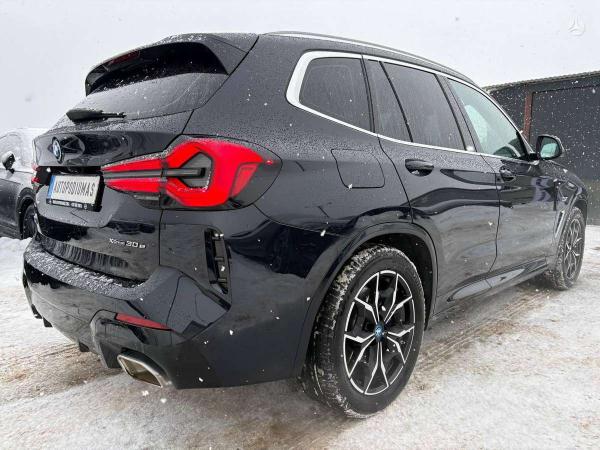 Black BMW X3 2022 in Vilnius, with an engine capacity of 2.00 L and mileage of 180 thousand km for 29900 €, photo 6 on AUTOMOTO.COM.LV