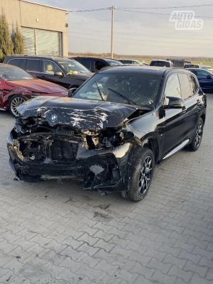 Black BMW X3 2022 in Radviliskis, with an engine capacity of 3.00 L and mileage of 58 thousand km for 17000 €, photo 15 on AUTOMOTO.COM.LV
