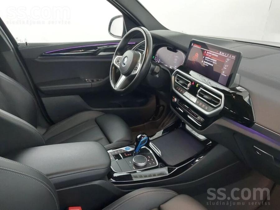 Black BMW X3 2022 in Riga, with an engine capacity of 3.00 L and mileage of 120 thousand km for 33500 €, photo 15 on AUTOMOTO.COM.LV