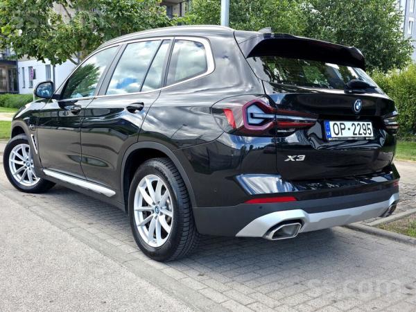 Black BMW X3 2022 in Riga, with an engine capacity of 2.00 L and mileage of 128 thousand km for 29990 €, photo 5 on AUTOMOTO.COM.LV