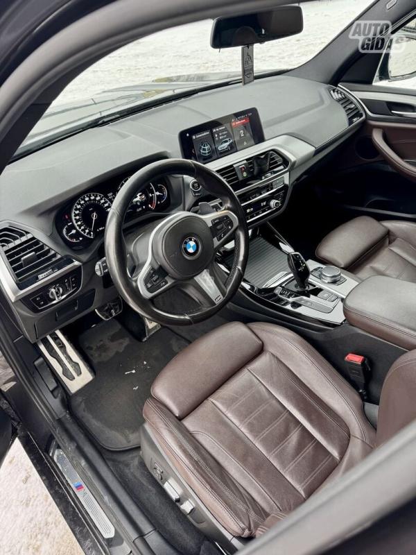Blue BMW X3 2017 in Kaunas, with an engine capacity of 2.00 L and mileage of 196 thousand km for 24999 €, photo 6 on AUTOMOTO.COM.LV