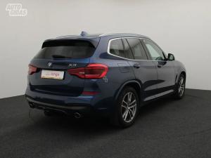 Blue BMW X3 2018 in Vilnius, with an engine capacity of 3.00 L and mileage of 242 thousand km for 24999 €, photo 9 on AUTOMOTO.COM.LV