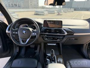 Blue BMW X3 2018 in Riga, with an engine capacity of 2.00 L and mileage of 205 thousand km for 21800 €, photo 11 on AUTOMOTO.COM.LV