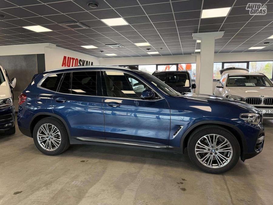 Blue BMW X3 2021 in Klaipeda, with an engine capacity of 2.00 L and mileage of 234 thousand km for 27900 €, photo 14 on AUTOMOTO.COM.LV