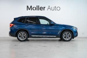 Blue BMW X3 2022 in Vilnius, with an engine capacity of 3.00 L and mileage of 133 thousand km for 35900 €, photo 9 on AUTOMOTO.COM.LV