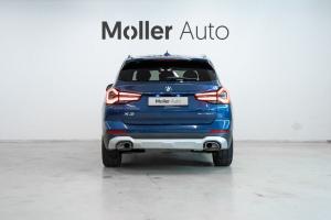 Blue BMW X3 2022 in Vilnius, with an engine capacity of 3.00 L and mileage of 133 thousand km for 35900 €, photo 11 on AUTOMOTO.COM.LV