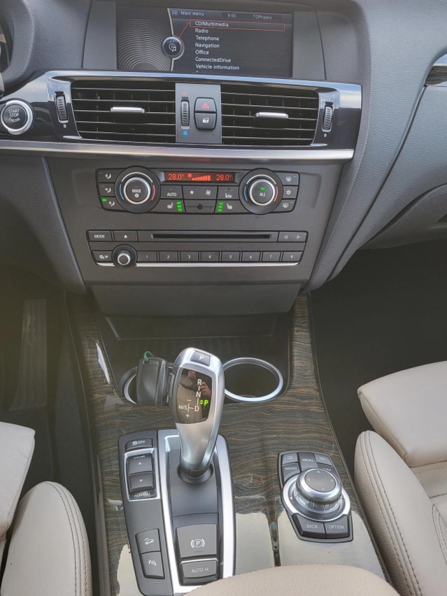 Brown BMW X3 2012 in Riga, with an engine capacity of 3.00 L and mileage of 266 thousand km for 12990 €, photo 13 on AUTOMOTO.COM.LV