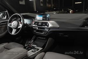 Green BMW x3-m 2021 in Riga, with an engine capacity of 3.00 L and mileage of 93 thousand km for 52990 €, photo 13 on AUTOMOTO.COM.LV