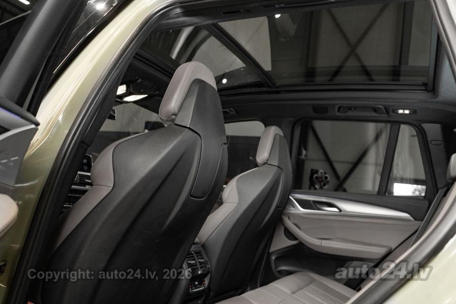 Green BMW x3-m 2021 in Riga, with an engine capacity of 3.00 L and mileage of 93 thousand km for 52990 €, photo 15 on AUTOMOTO.COM.LV