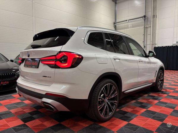 White BMW X3 2023 in Vilnius, with an engine capacity of 2.00 L and mileage of 141 thousand km for 31990 €, photo 4 on AUTOMOTO.COM.LV