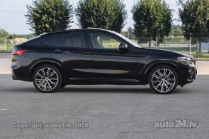 Black BMW X4 2019 in Tallinn, with an engine capacity of 3.00 L and mileage of 167 thousand km for 32990 €, photo 7 on AUTOMOTO.COM.LV