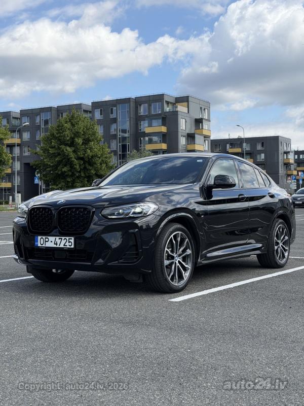 Black BMW X4 2024 in Riga, with an engine capacity of 3.00 L and mileage of 71 thousand km for 54340 €, photo 1 on AUTOMOTO.COM.LV