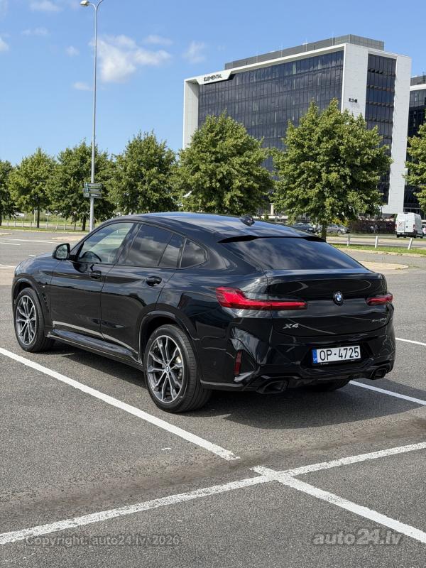 Black BMW X4 2024 in Riga, with an engine capacity of 3.00 L and mileage of 71 thousand km for 54340 €, photo 2 on AUTOMOTO.COM.LV