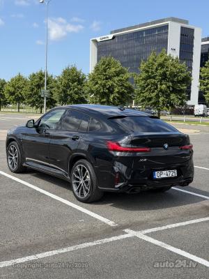 Black BMW X4 2024 in Riga, with an engine capacity of 3.00 L and mileage of 71 thousand km for 54340 €, photo 3 on AUTOMOTO.COM.LV