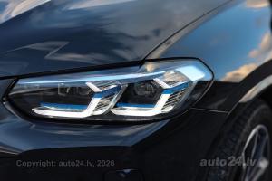 Black BMW X4 2024 in Riga, with an engine capacity of 3.00 L and mileage of 71 thousand km for 54340 €, photo 7 on AUTOMOTO.COM.LV
