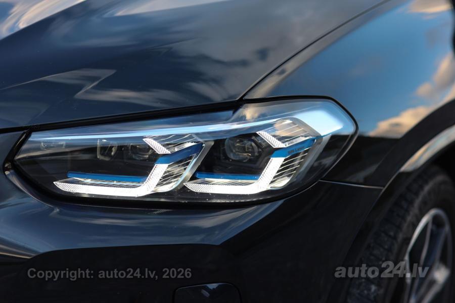 Black BMW X4 2024 in Riga, with an engine capacity of 3.00 L and mileage of 71 thousand km for 54340 €, photo 7 on AUTOMOTO.COM.LV