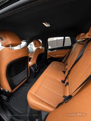 Black BMW X4 2024 in Riga, with an engine capacity of 3.00 L and mileage of 71 thousand km for 54340 €, photo 10 on AUTOMOTO.COM.LV