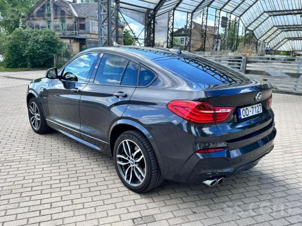 Black BMW X4 2014 in Riga, with an engine capacity of 3.00 L and mileage of 212 thousand km for 17000 €, photo 4 on AUTOMOTO.COM.LV