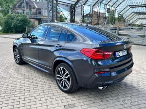 Black BMW X4 2014 in Riga, with an engine capacity of 3.00 L and mileage of 212 thousand km for 17000 €, photo 4 on AUTOMOTO.COM.LV