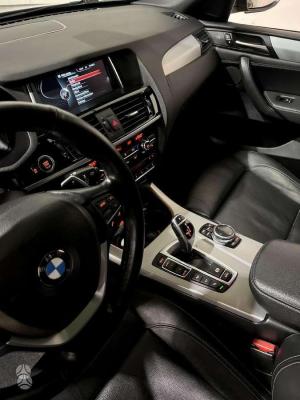 Black BMW X4 2014 in Klaipeda, with an engine capacity of 2.99 L and mileage of 228 thousand km for 17999 €, photo 10 on AUTOMOTO.COM.LV