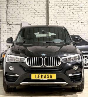 Black BMW X4 2014 in Klaipeda, with an engine capacity of 2.99 L and mileage of 228 thousand km for 17999 €, photo 13 on AUTOMOTO.COM.LV