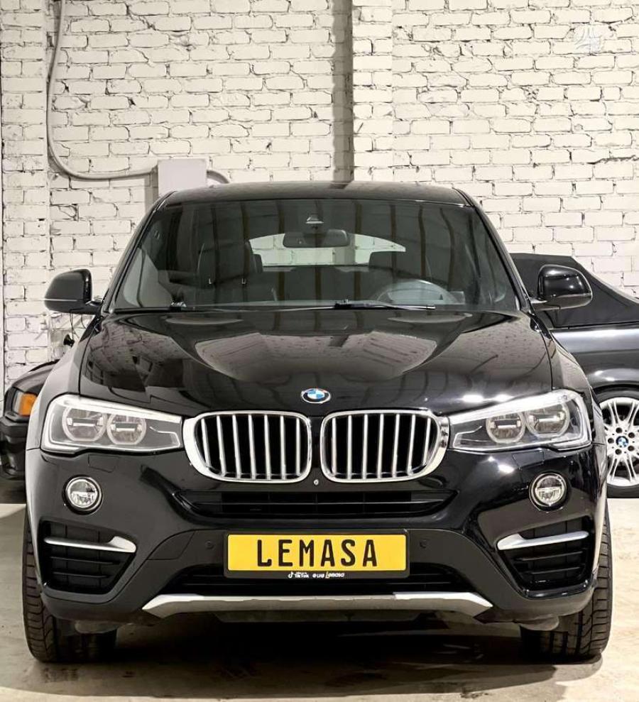 Black BMW X4 2014 in Klaipeda, with an engine capacity of 2.99 L and mileage of 228 thousand km for 17999 €, photo 13 on AUTOMOTO.COM.LV