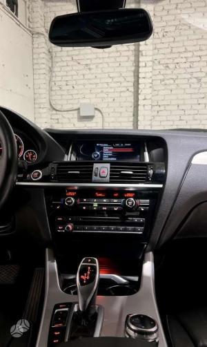 Black BMW X4 2014 in Klaipeda, with an engine capacity of 2.99 L and mileage of 228 thousand km for 17999 €, photo 14 on AUTOMOTO.COM.LV