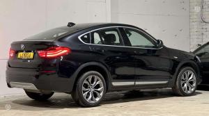 Black BMW X4 2014 in Klaipeda, with an engine capacity of 2.99 L and mileage of 228 thousand km for 17999 €, photo 17 on AUTOMOTO.COM.LV