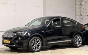 Black BMW X4 2014 in Klaipeda, with an engine capacity of 2.99 L and mileage of 228 thousand km for 17999 €, photo 18 on AUTOMOTO.COM.LV