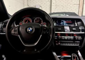 Black BMW X4 2014 in Klaipeda, with an engine capacity of 2.99 L and mileage of 228 thousand km for 17999 €, photo 30 on AUTOMOTO.COM.LV