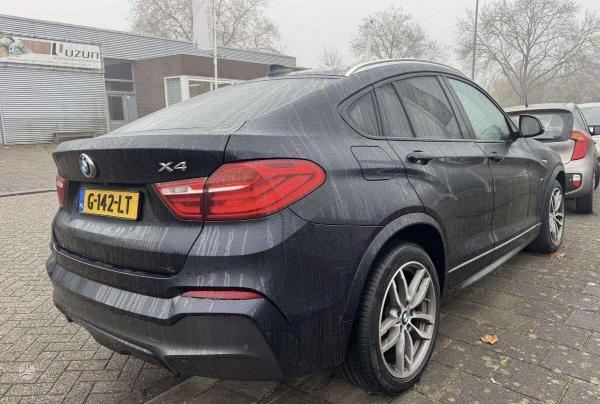 Black BMW X4 2014 in Raseiniai, with an engine capacity of 2.99 L and mileage of 260 thousand km for 11999 €, photo 4 on AUTOMOTO.COM.LV