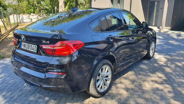 Black BMW X4 2014 in Vilnius, with an engine capacity of 2.99 L and mileage of 179 thousand km for 15600 €, photo 4 on AUTOMOTO.COM.LV