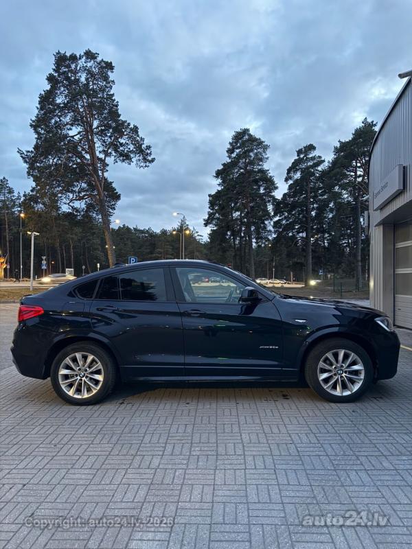 Black BMW X4 2014 in Tallinn, with an engine capacity of 3.00 L and mileage of 182 thousand km for 16500 €, photo 4 on AUTOMOTO.COM.LV