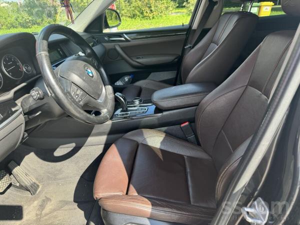 Black BMW X4 2014 in Riga, with an engine capacity of 3.00 L and mileage of 296 thousand km for 15500 €, photo 9 on AUTOMOTO.COM.LV