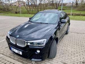Black BMW X4 2014 in Rezekne, with an engine capacity of 3.00 L and mileage of 227 thousand km for 18950 €, photo 5 on AUTOMOTO.COM.LV