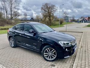 Black BMW X4 2014 in Rezekne, with an engine capacity of 3.00 L and mileage of 227 thousand km for 18950 €, photo 6 on AUTOMOTO.COM.LV