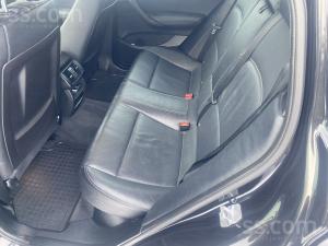 Black BMW X4 2014 in Rezekne, with an engine capacity of 3.00 L and mileage of 227 thousand km for 18950 €, photo 15 on AUTOMOTO.COM.LV
